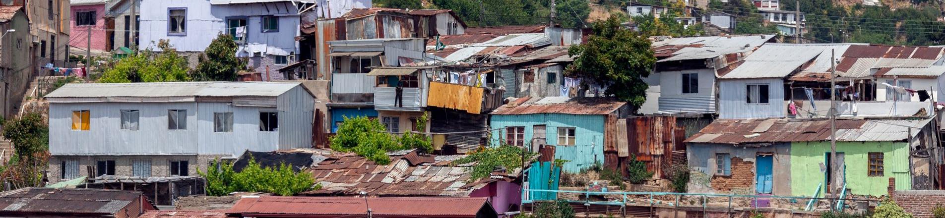 Upgrading vs relocating: Policy lessons on slum renewal